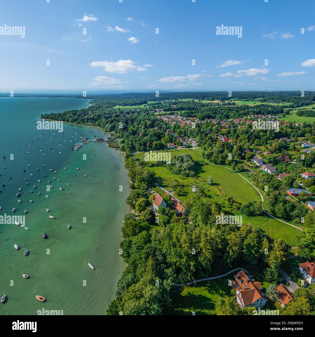 Aerial view to the idyllic bavarian region around Utting on Ammersee in ...