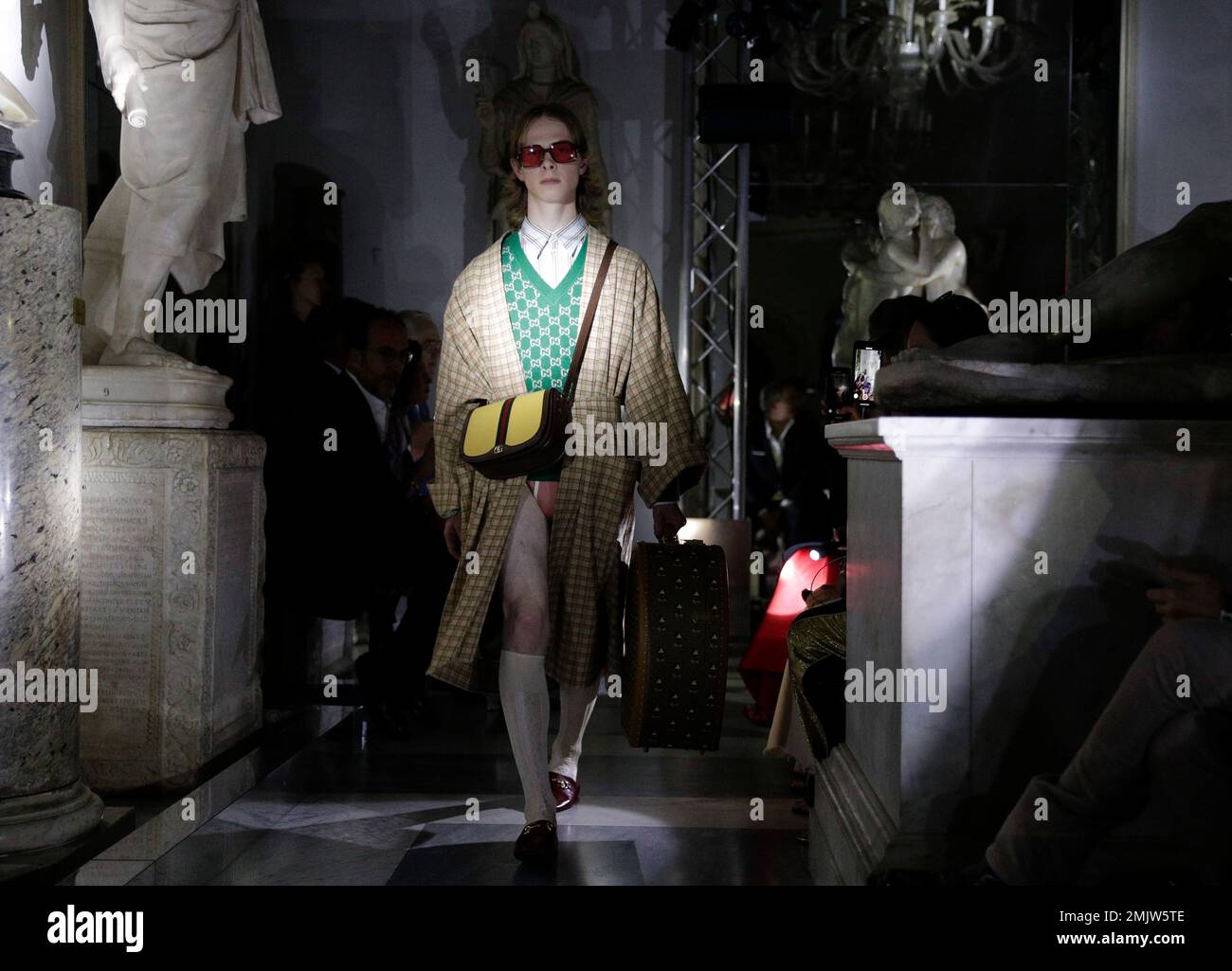A model wears a creation as part of the Gucci cruise collection that ...
