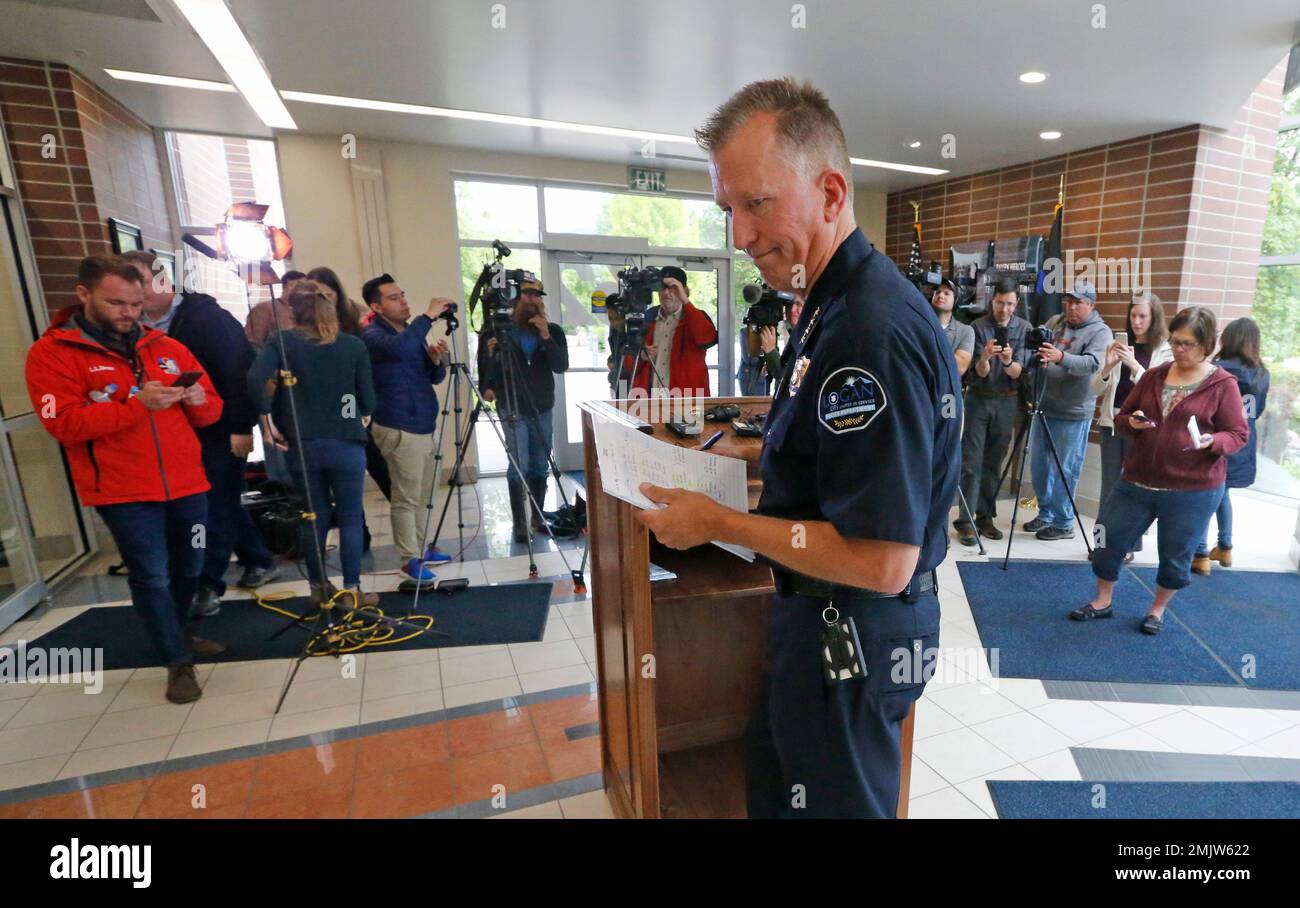 Logan Police Chief Gary Jensen walks away following a news conference ...