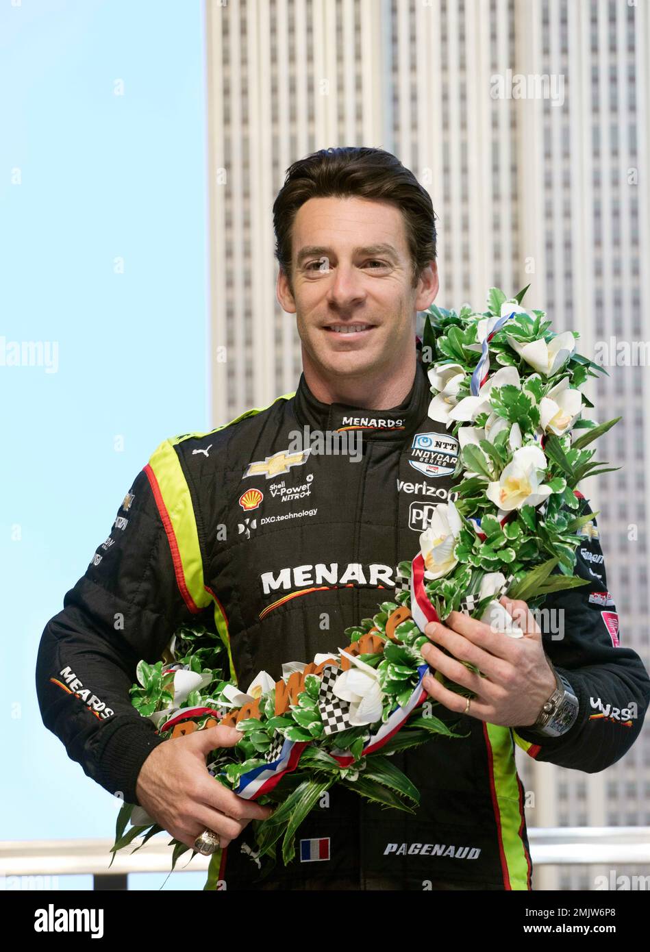 Simon Pagenaud, of France, winner of the Indy 500 auto race, poses with ...