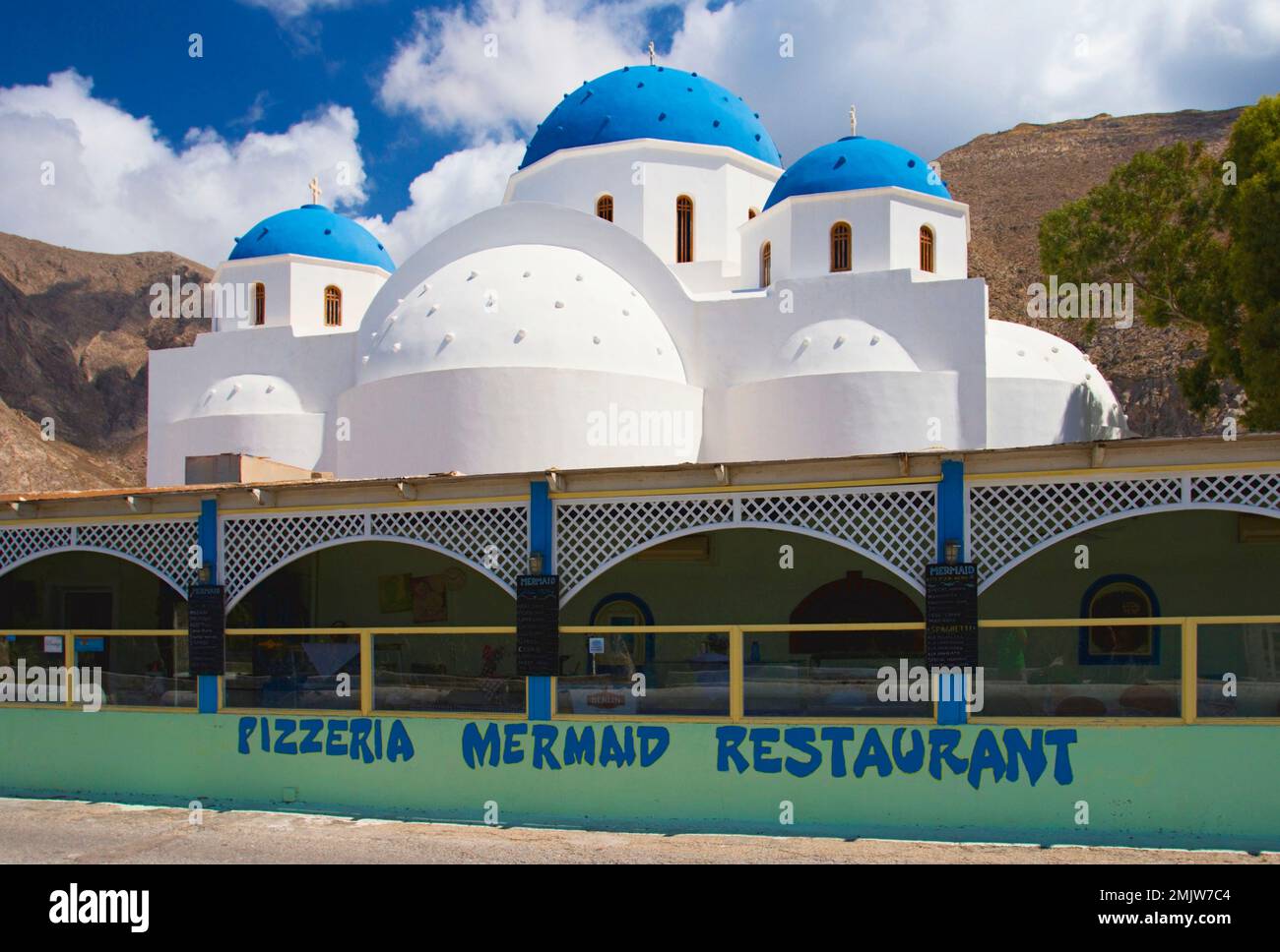 Orthodox church in the resort of Perissa on the island of Santorini in ...