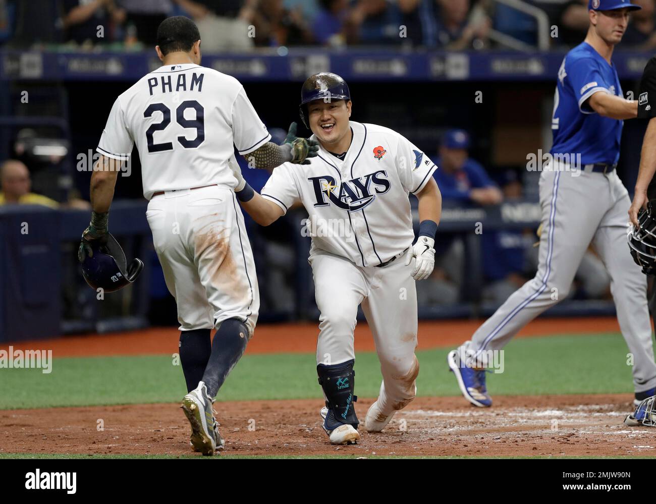 Tampa Bay Rays' Ji-Man Choi, right, celebrates with Tommy Pham after ...