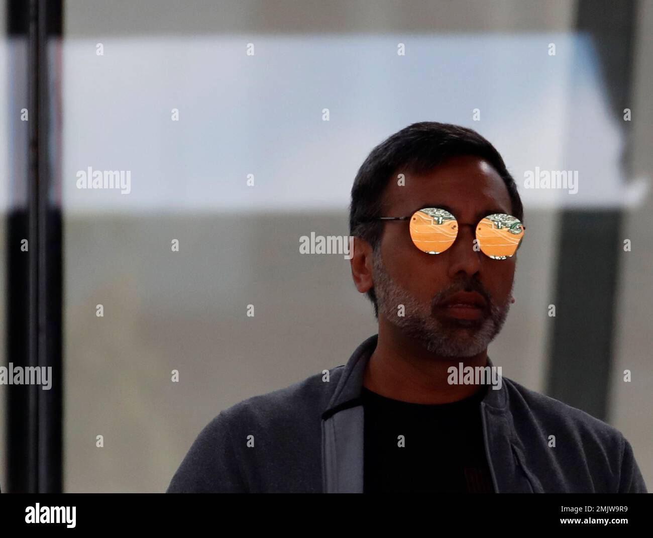 The new Simonne Mathieu court is reflected in the sunglasses of a ...