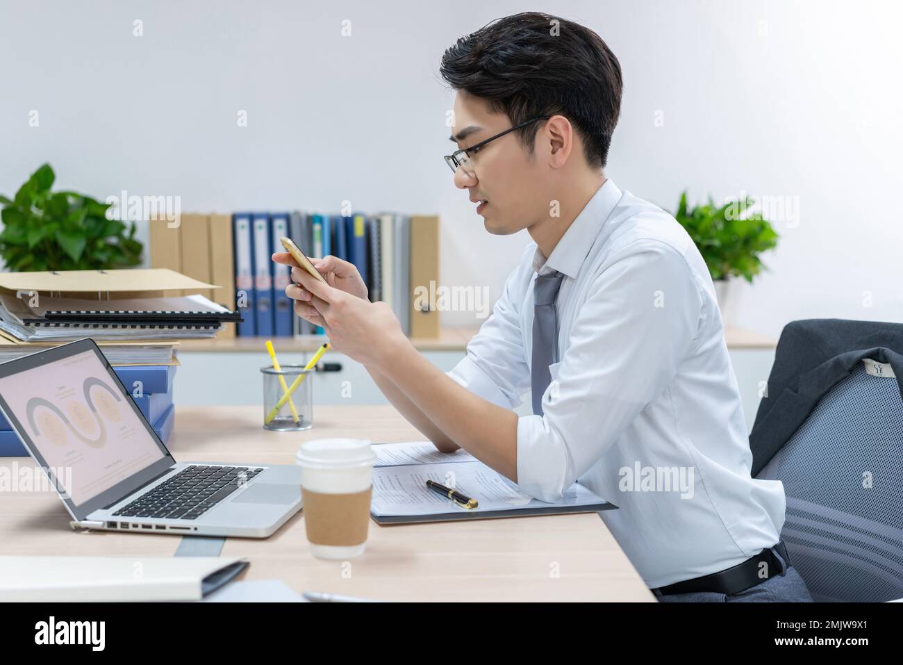Business men in the office to work overtime Stock Photo - Alamy