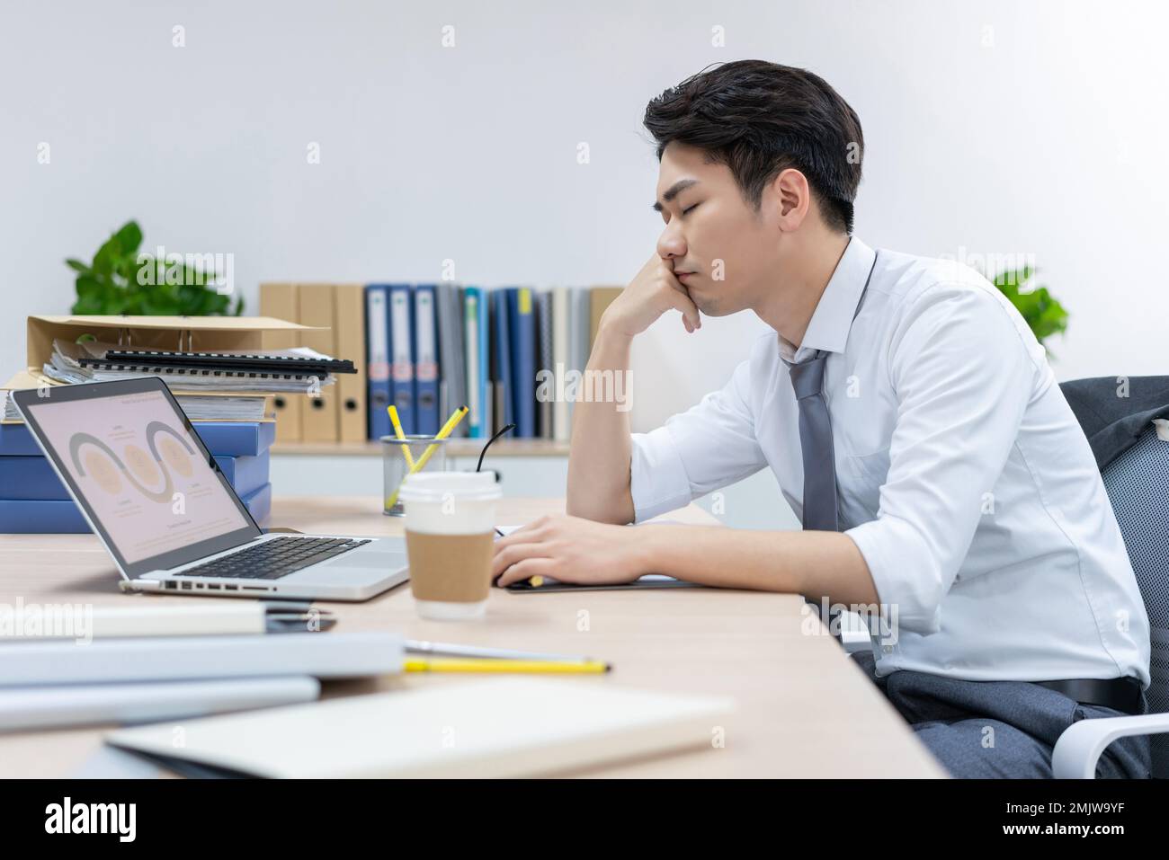 Business men in the office to work overtime Stock Photo - Alamy