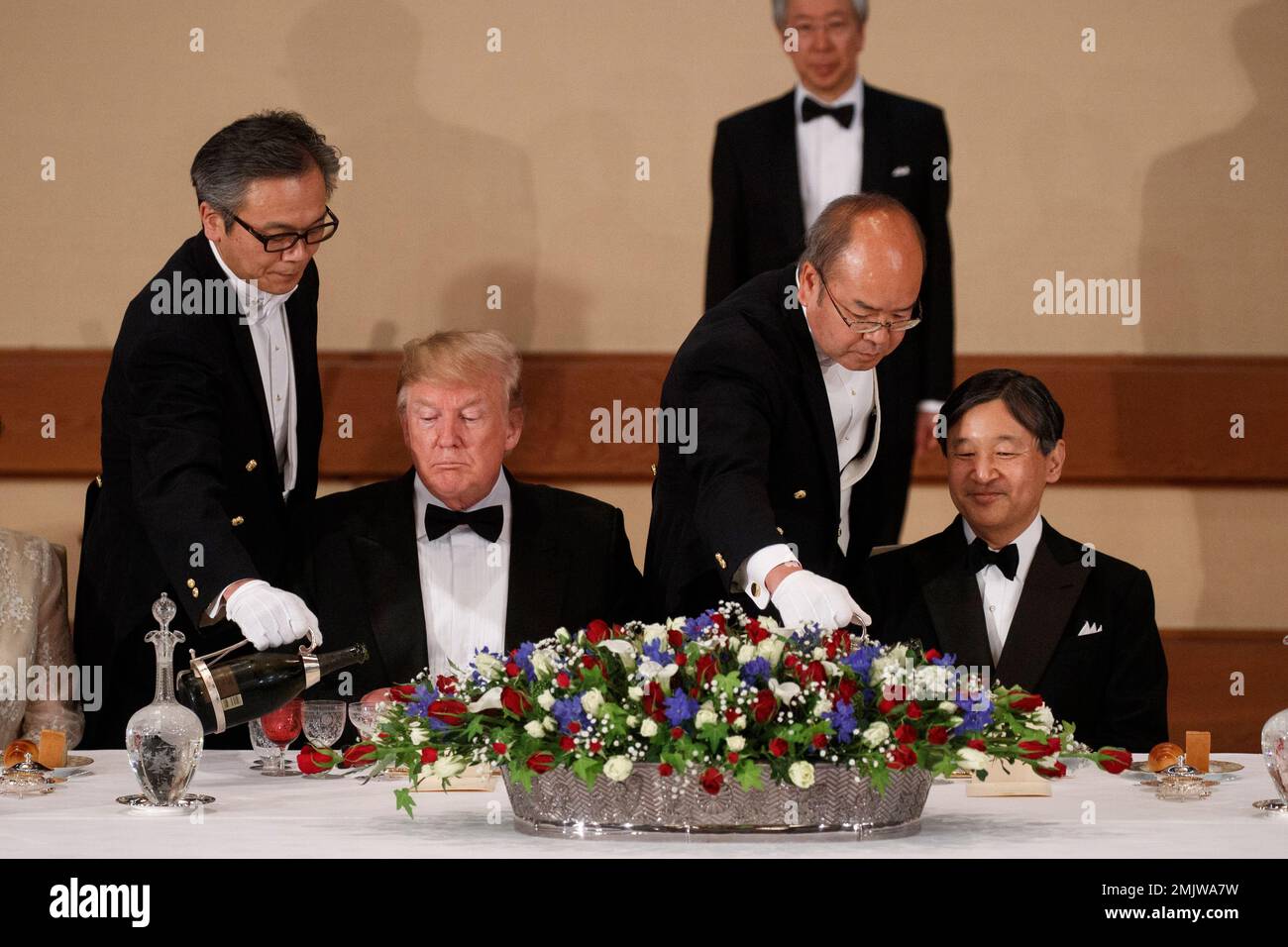 President Donald Trump sits with Japanese Emperor Naruhito during a ...