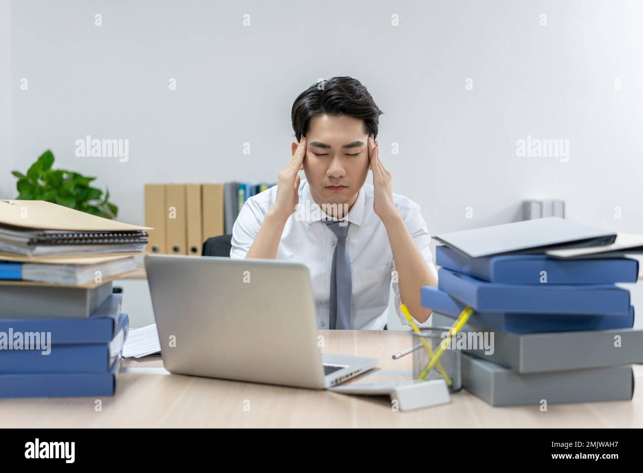 Business men in the office to work overtime Stock Photo - Alamy