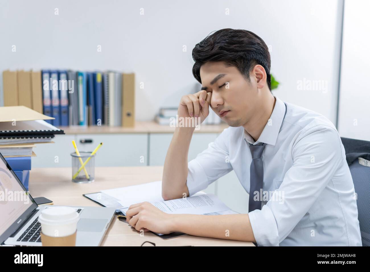 Business men in the office to work overtime Stock Photo - Alamy