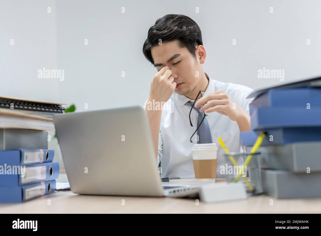 Business men in the office to work overtime Stock Photo - Alamy