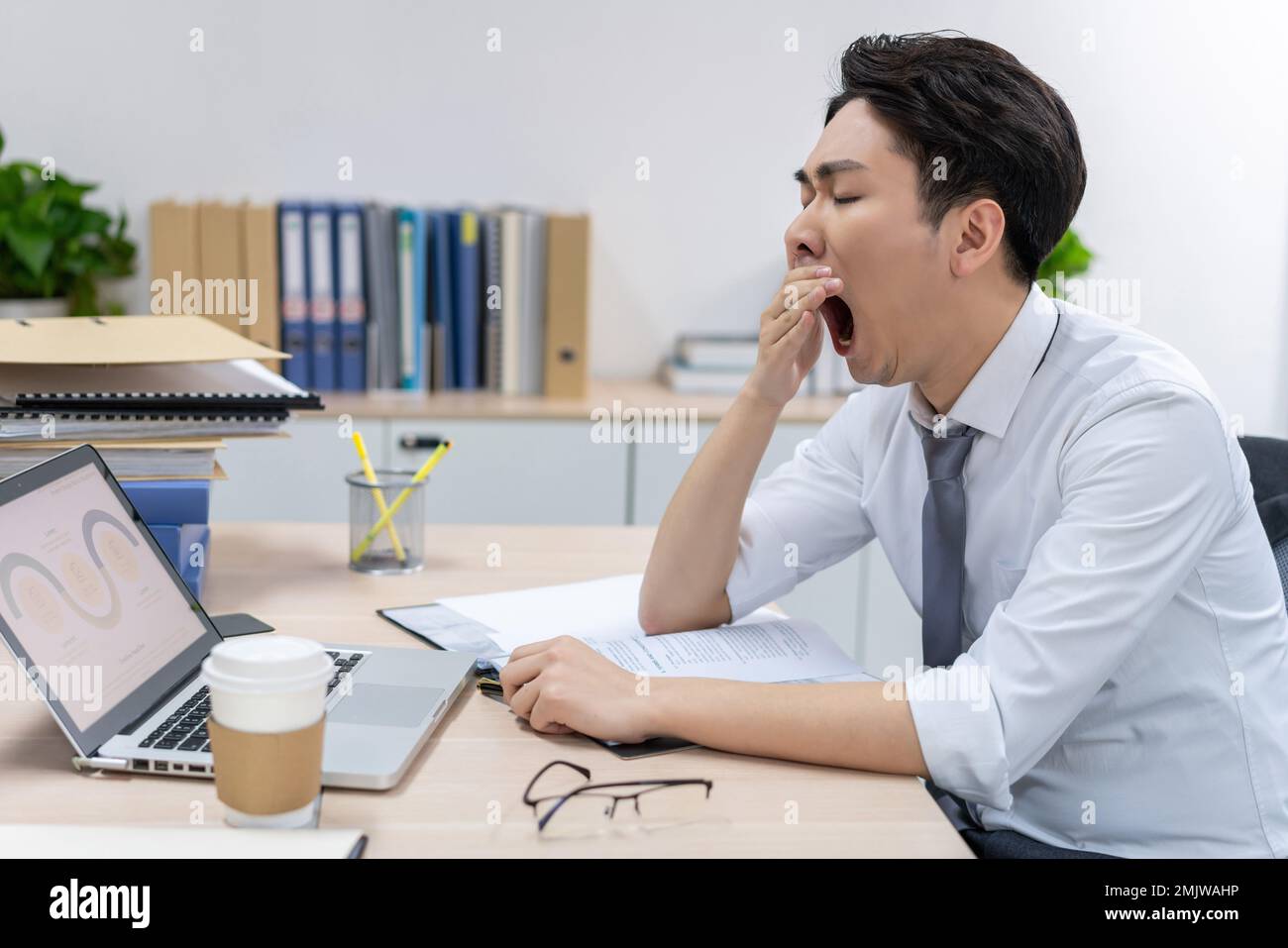 Business men in the office to work overtime Stock Photo - Alamy