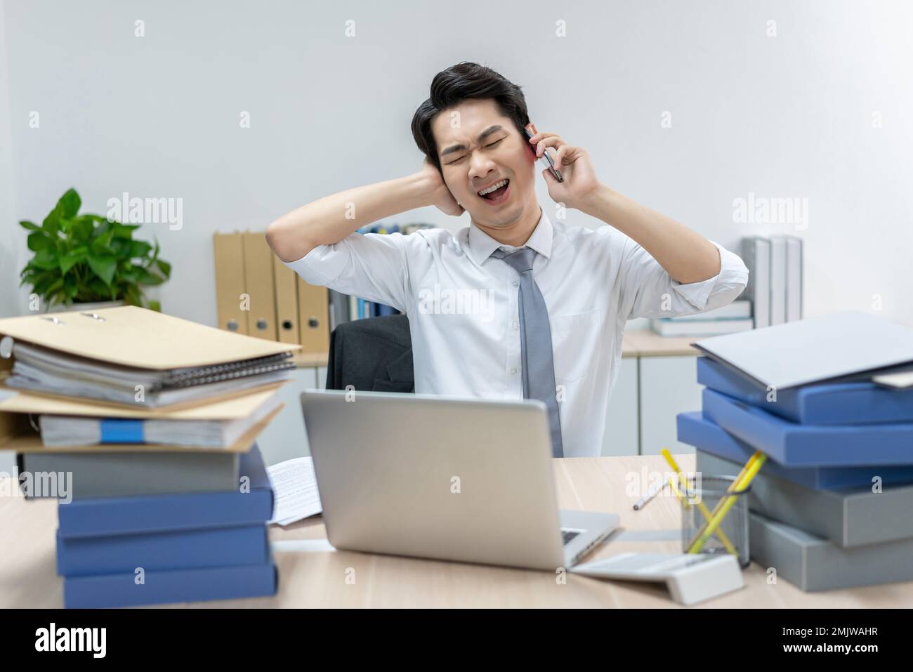 Business men in the office to work overtime Stock Photo - Alamy
