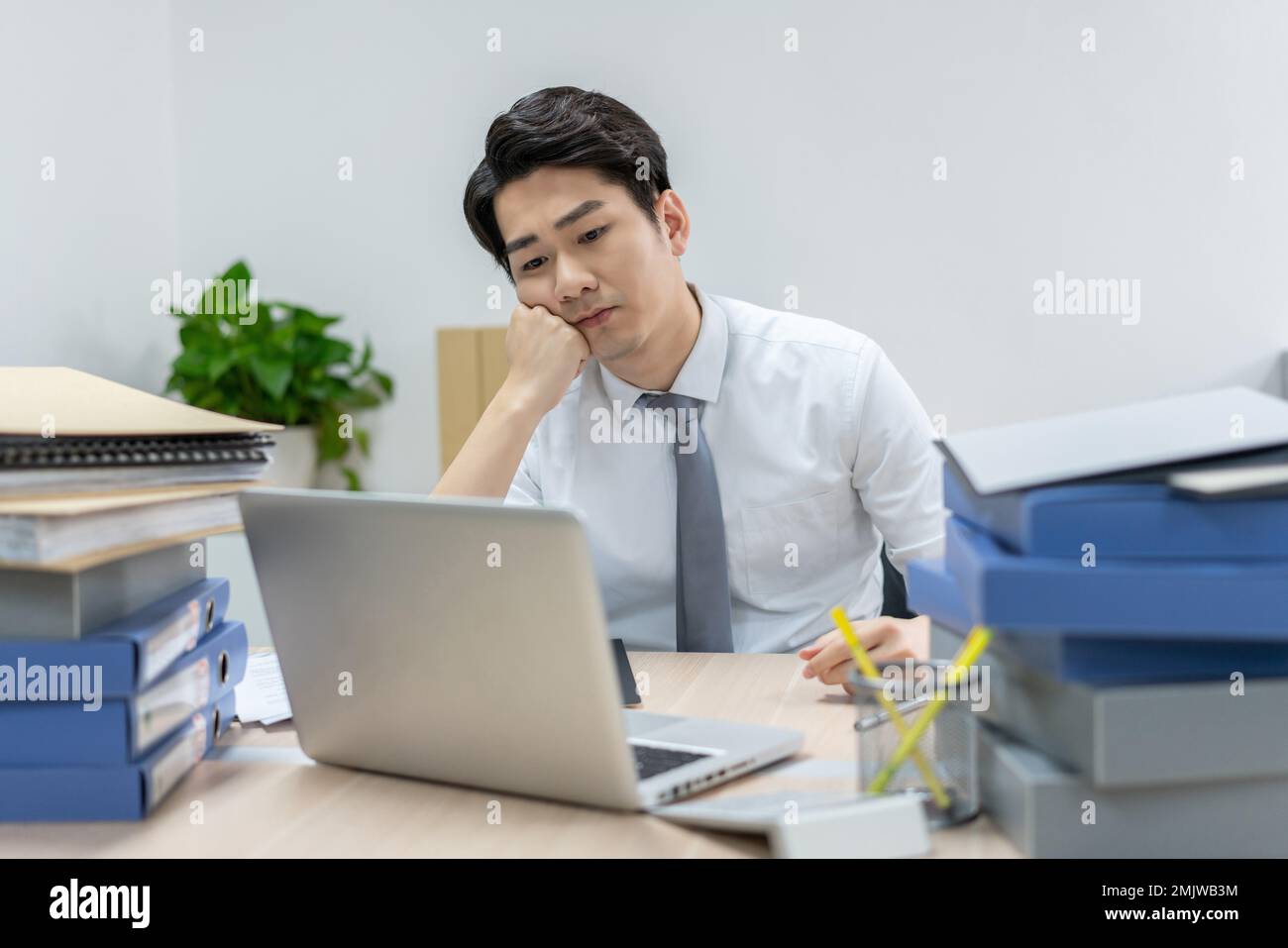 Business men in the office to work overtime Stock Photo - Alamy