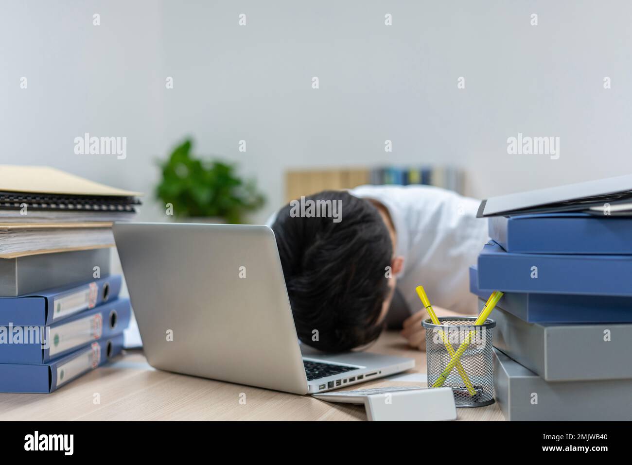 Business men in the office to work overtime Stock Photo - Alamy