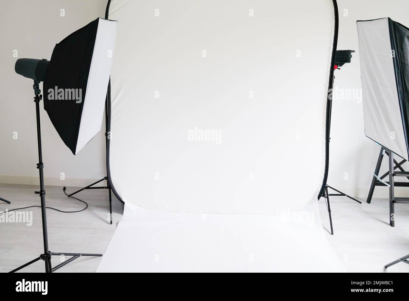 white professional photo studio room with light interior for shooting ...