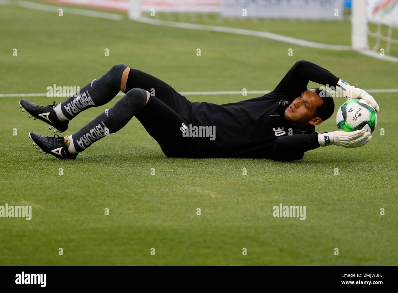 Leon goalkeeper Rodolfo Cota warms up prior to the final Mexico soccer ...