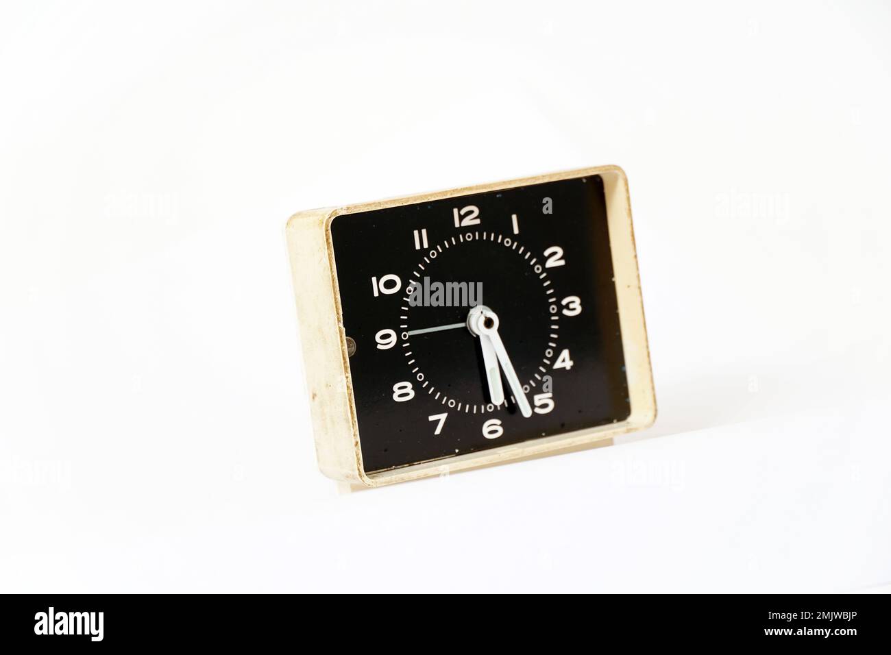 vintage black and white used dirty square clock isolated on white ...