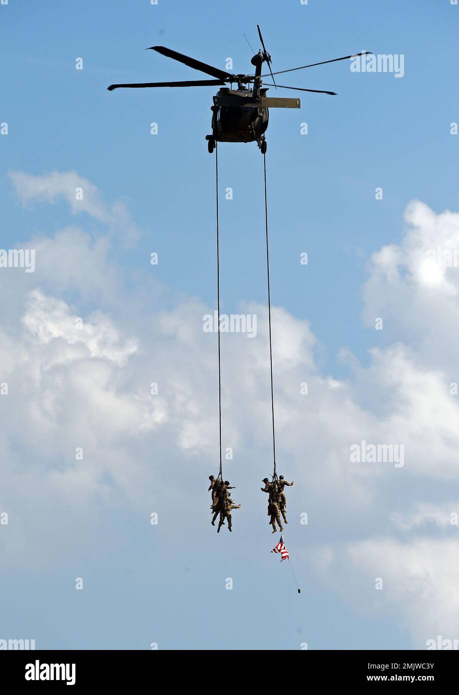 A Blackhawk helicopter carries soldiers away during activities before a ...