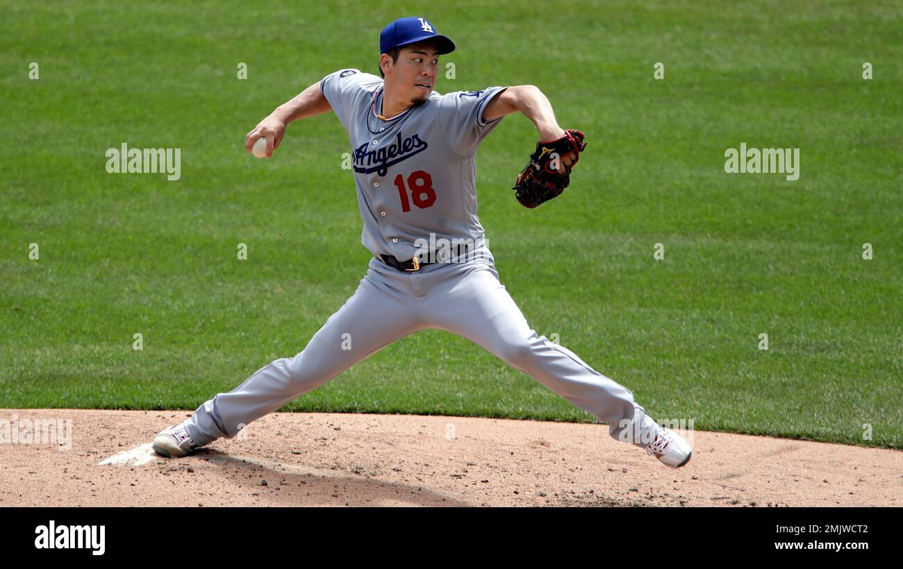 Los Angeles Dodgers starting pitcher Kenta Maeda delivers during the ...