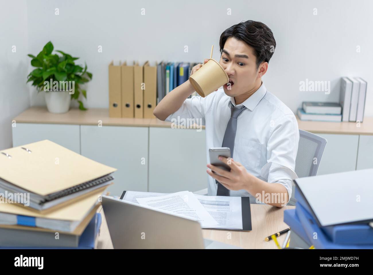 Business men in the office to work overtime Stock Photo - Alamy