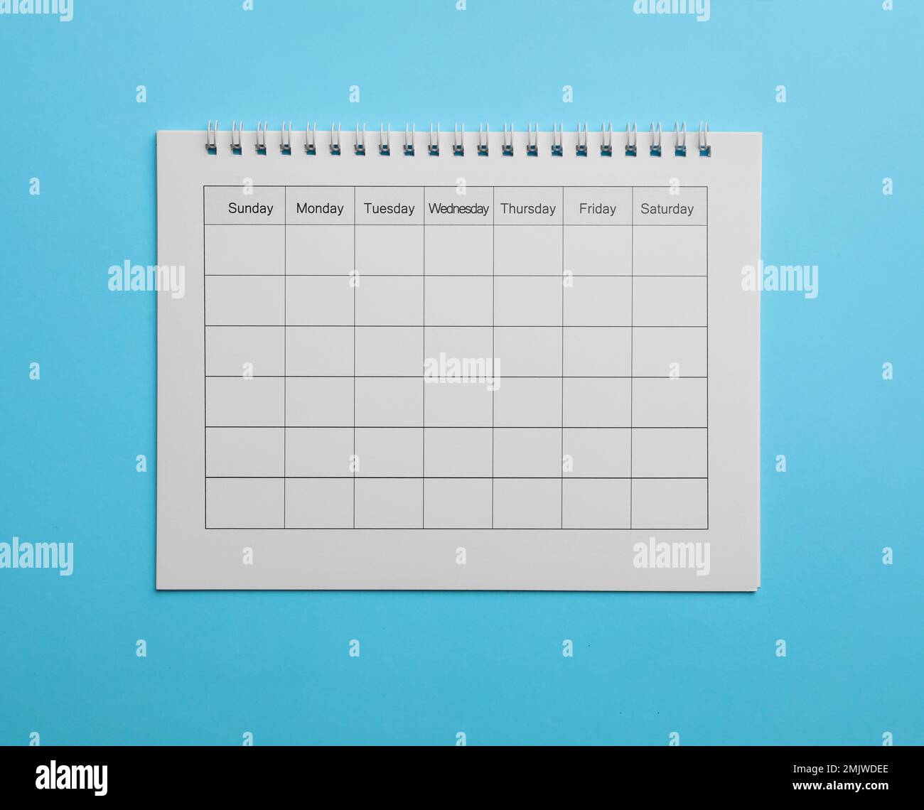 Blank calendar on light blue background, top view Stock Photo - Alamy