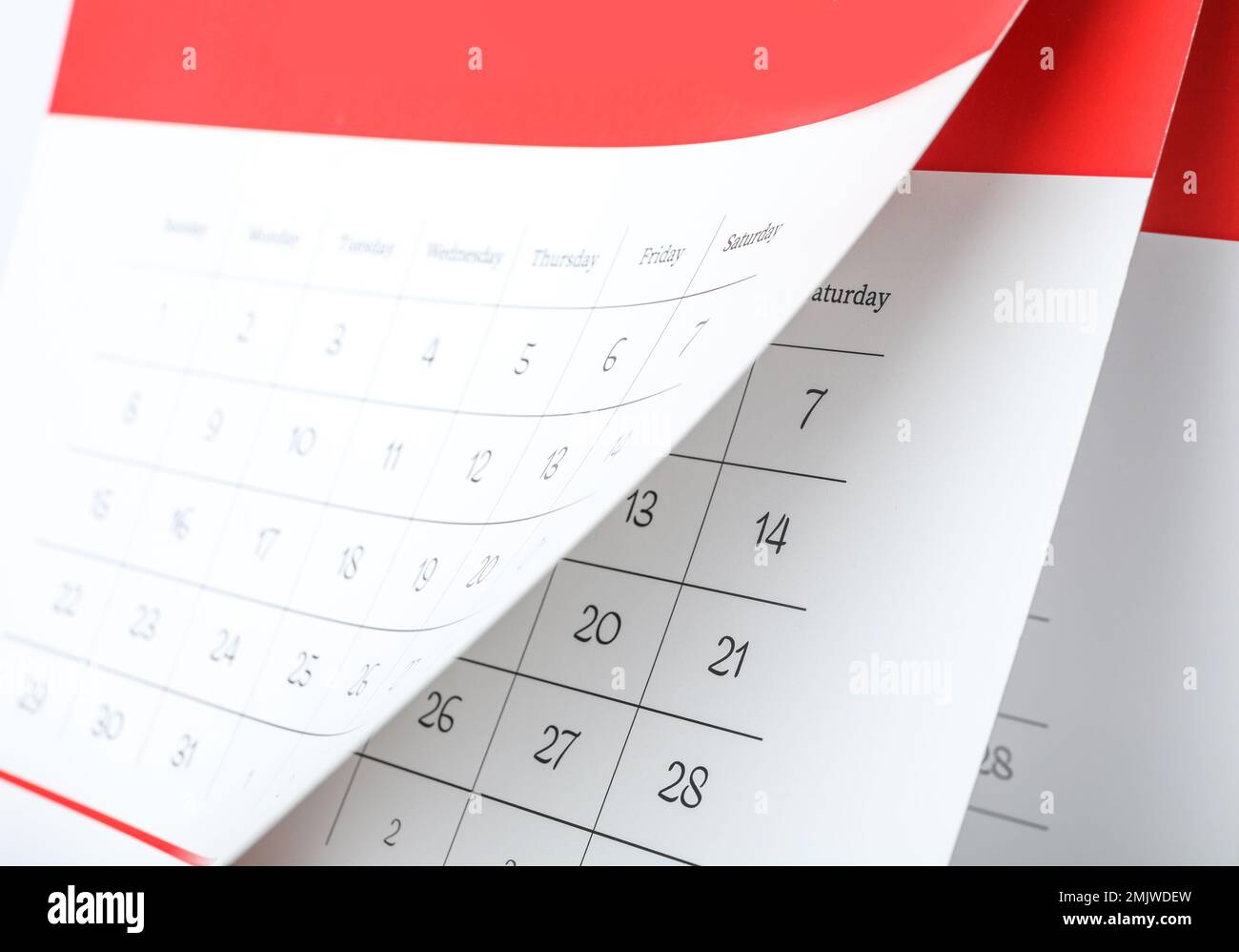 Paper calendar with turning pages as background, closeup Stock Photo ...