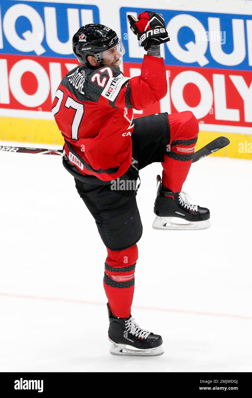 Canada's Shea Theodore (27) celebrates after scoring a goal against ...
