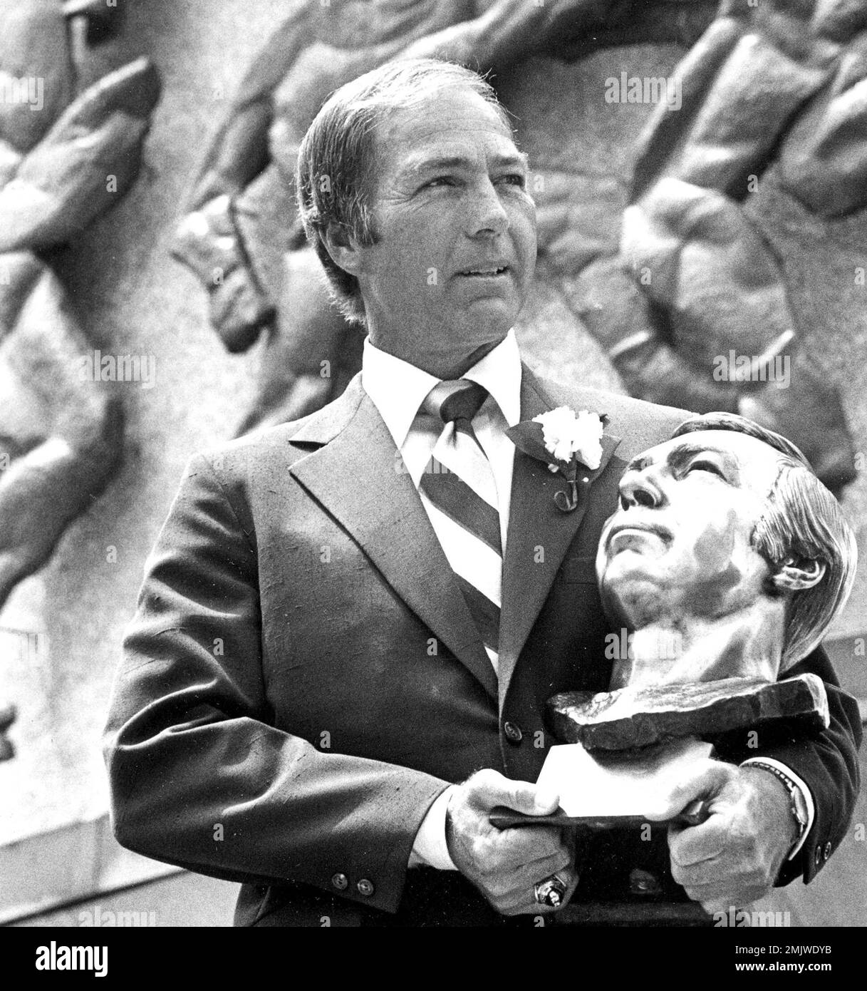 FILE - In this July 30, 1977, file photo, Bart Starr poses with his bust after his induction ...