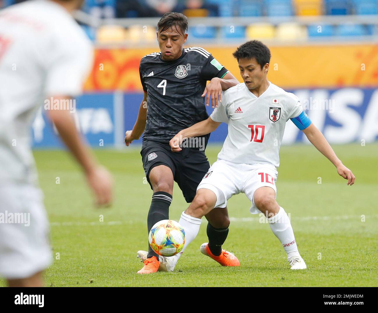 Mexico's Efrain Orona, left, and Japan's Mitsuki Saito challenge for ...