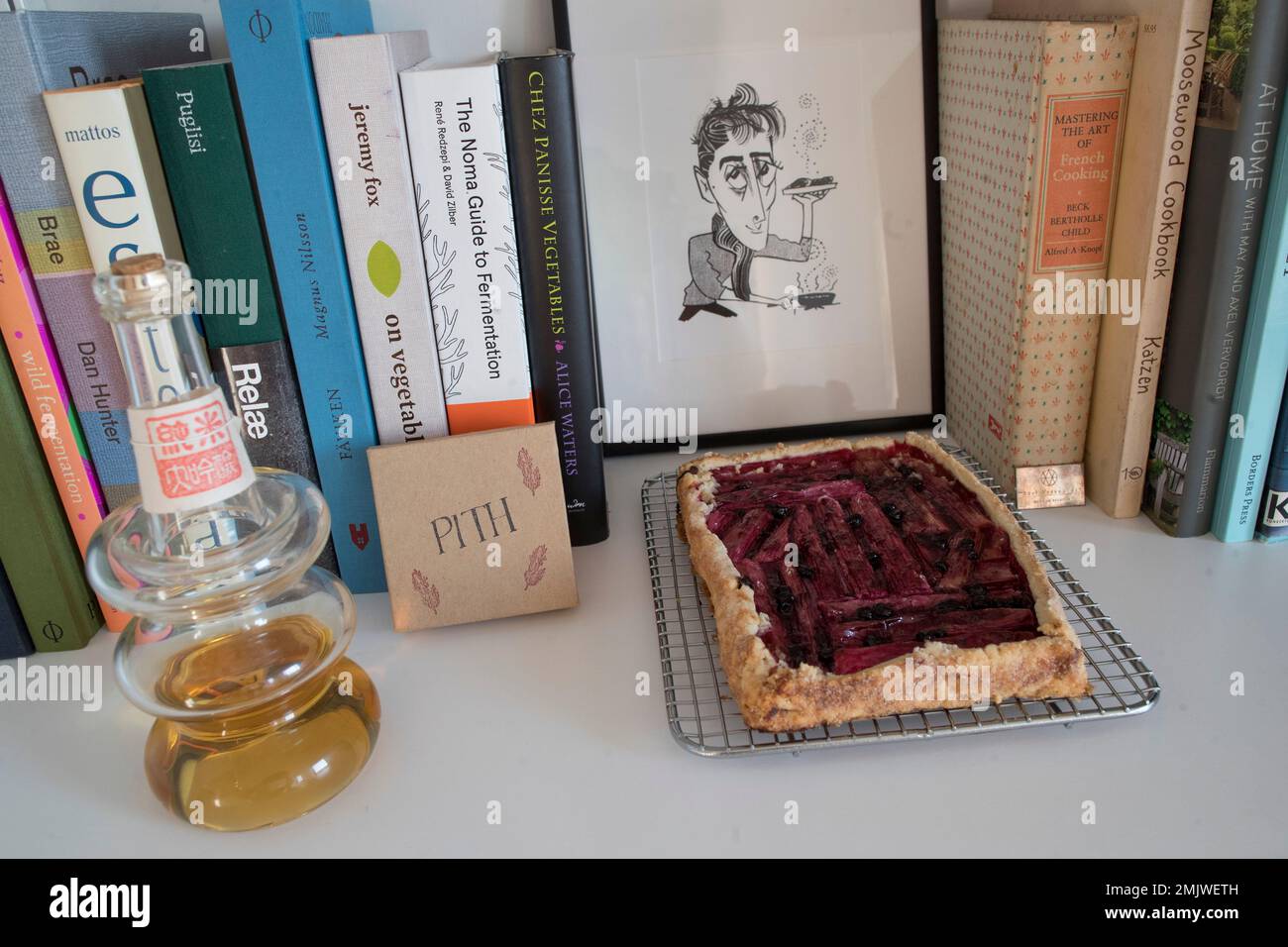 In this May 17, 2019 photo, a rhubarb tart is displayed with a ...