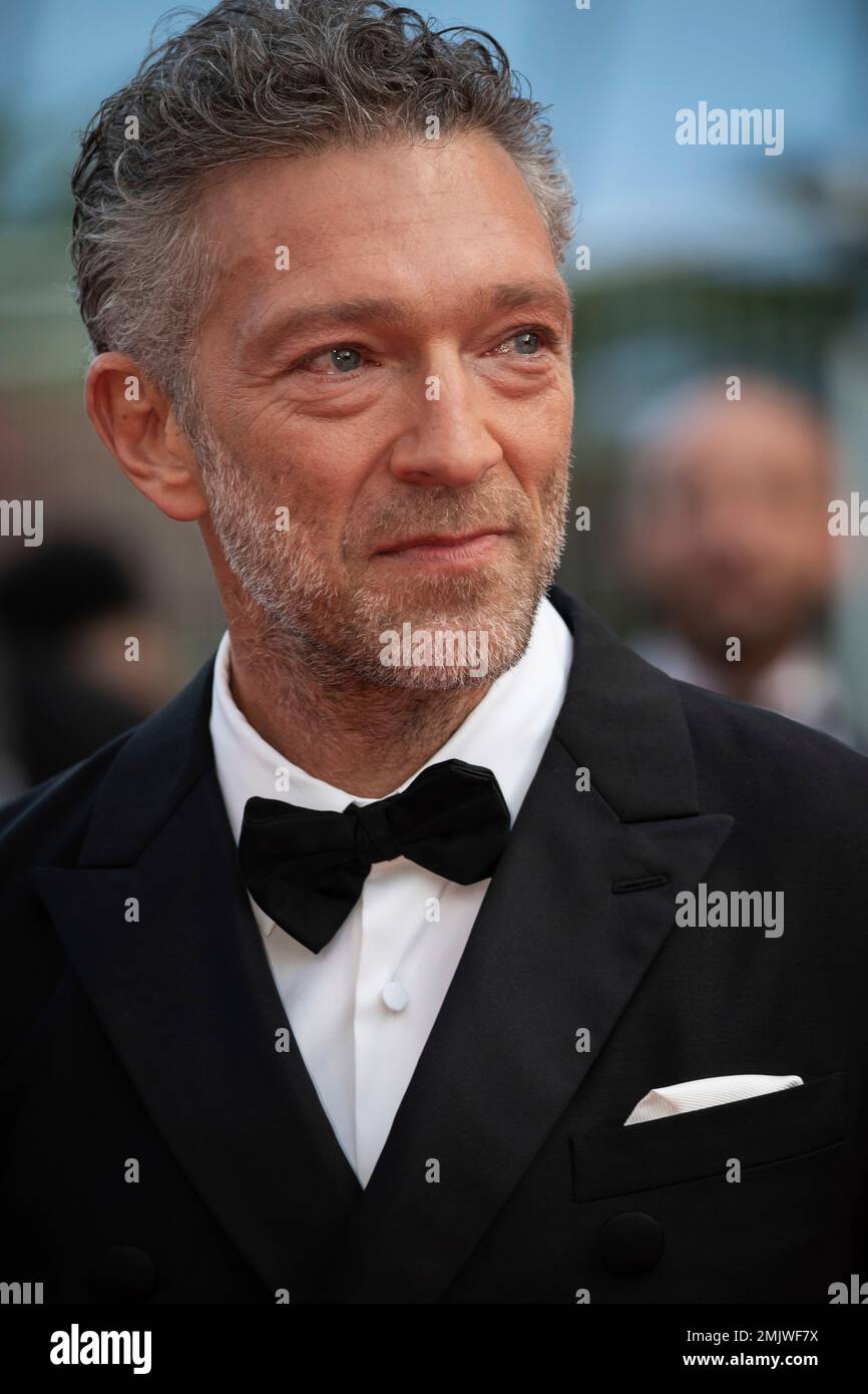 Actor Vincent Cassel poses for photographers upon arrival at the awards ...