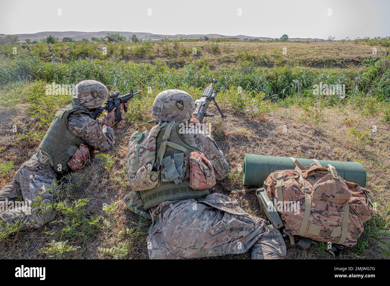 Georgian Defense Forces scan their sectors of fire for a defensive ...