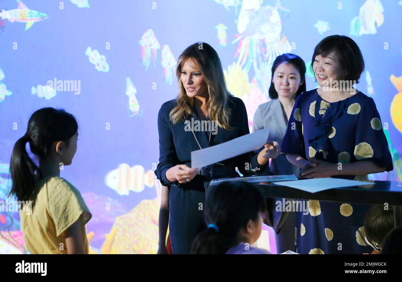 U.S. first lady Melania Trump, center, and Japanese Prime Minister ...