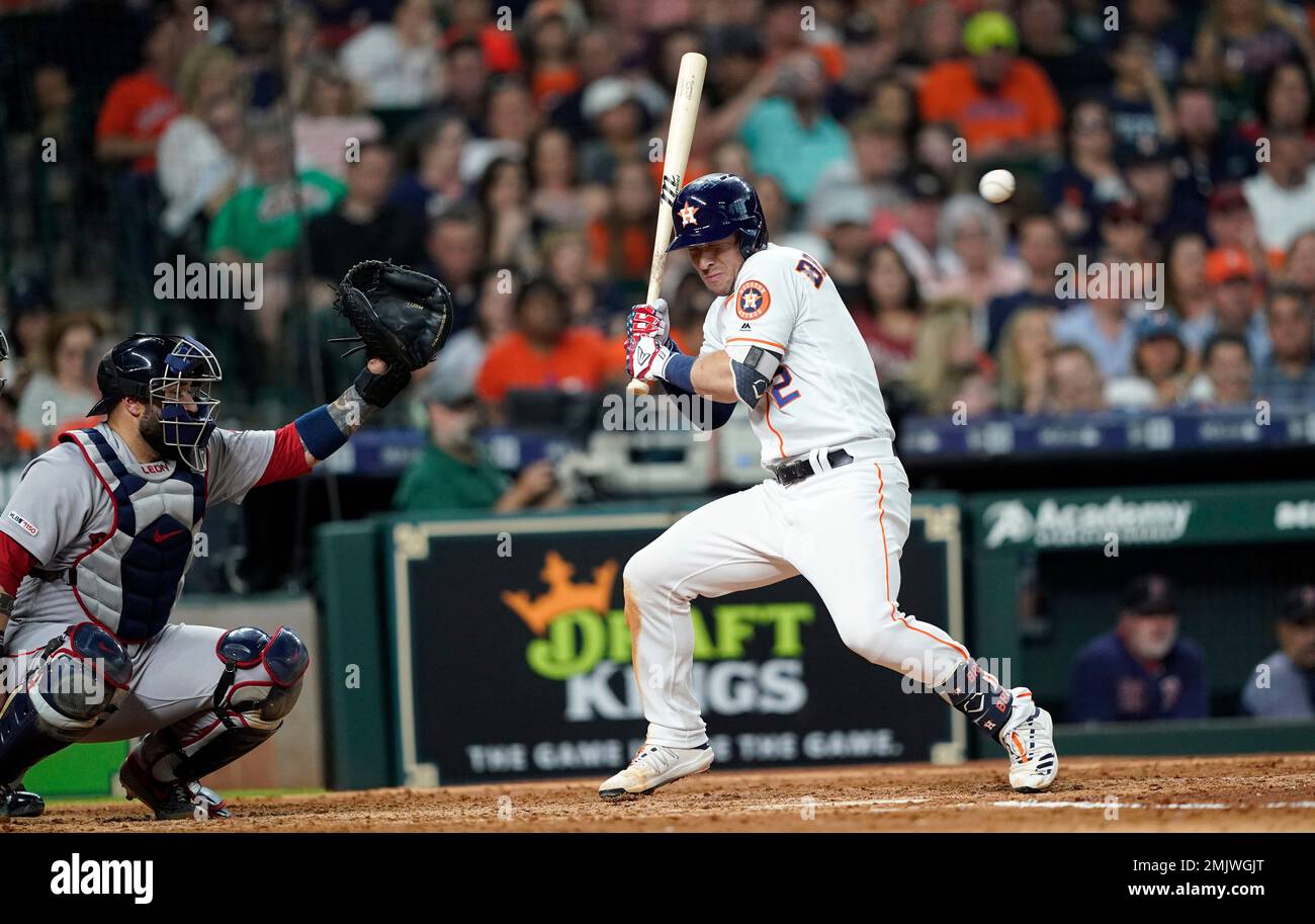 Houston Astros' Alex Bregman (2) ducks to avoid a pitch as Boston Red ...
