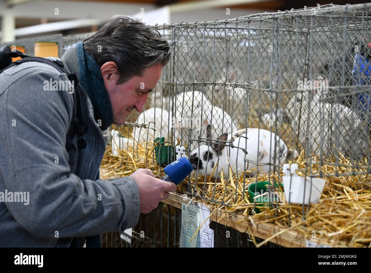 Kassel, Germany. 28th Jan, 2023. A radio reporter tries to elicit a ...