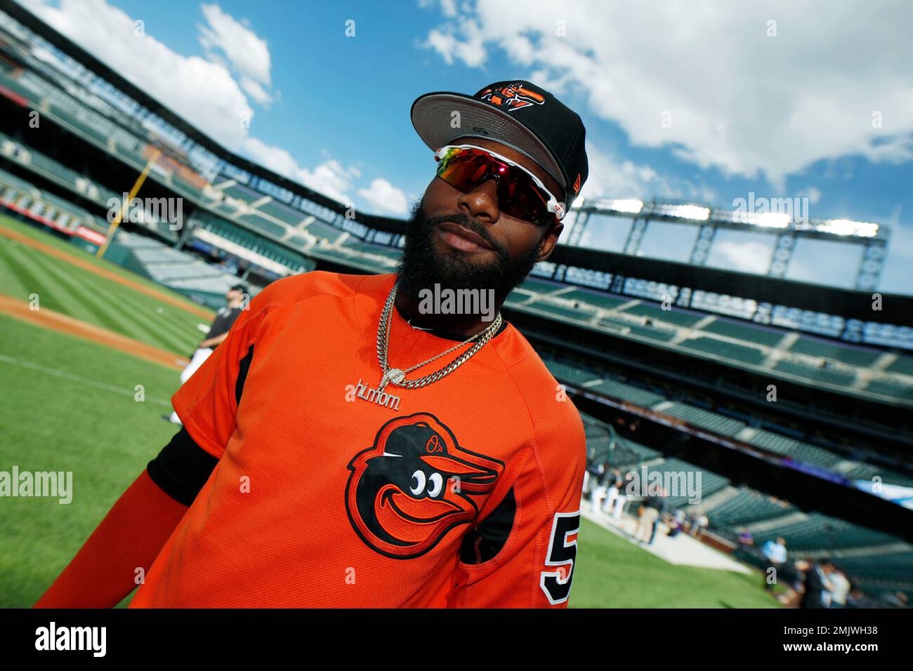 Baltimore Orioles relief pitcher Miguel Castro wears a chain with a ...