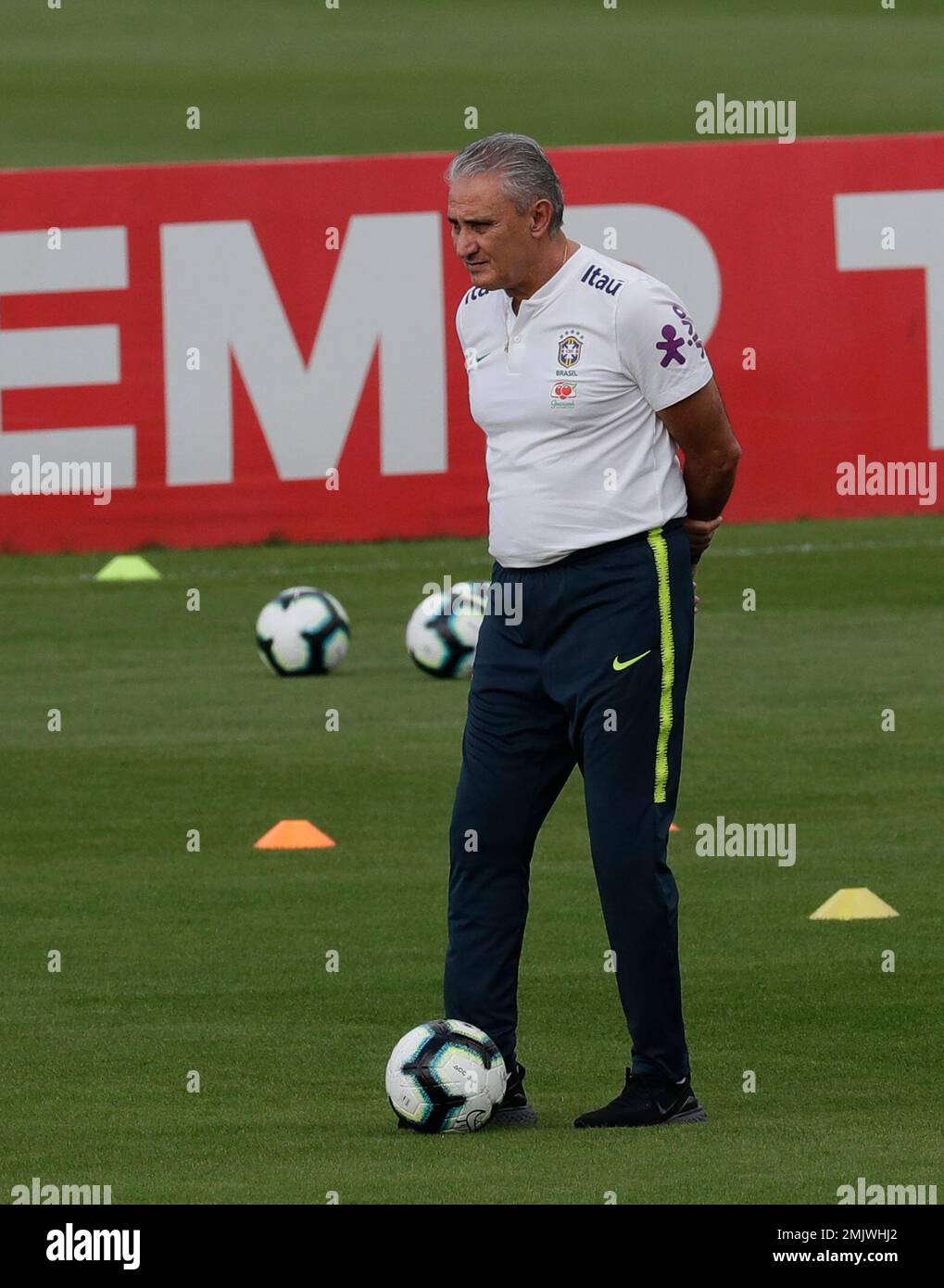 Brazil coach Tite stands on the pitch during a practice at the Granja ...
