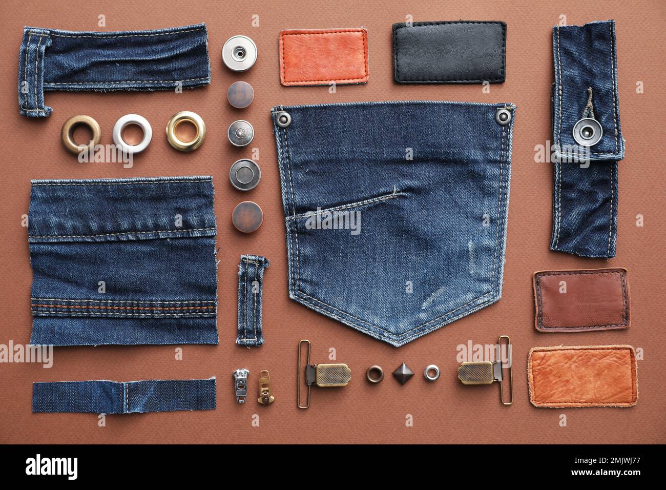 Flat lay composition with garment accessories and cutting details for ...