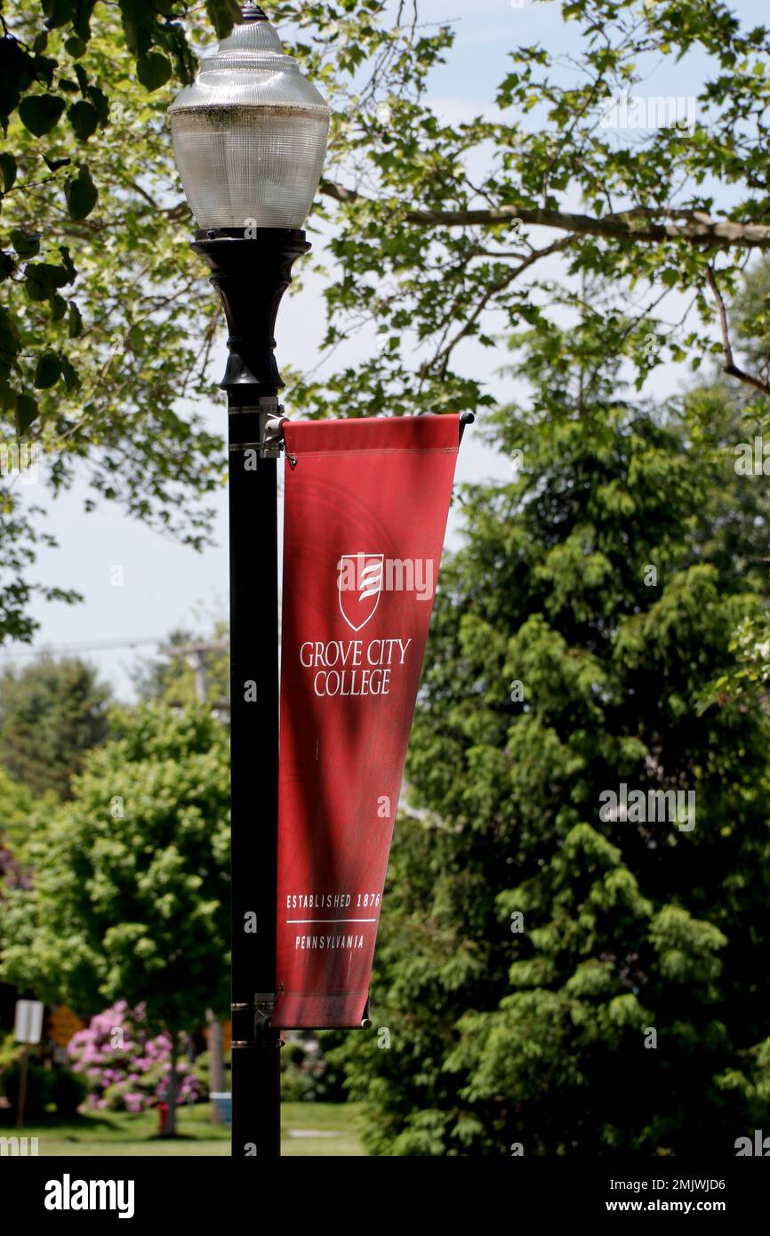 In this photo made on Friday, May 24, 2019, a school banner hangs from ...