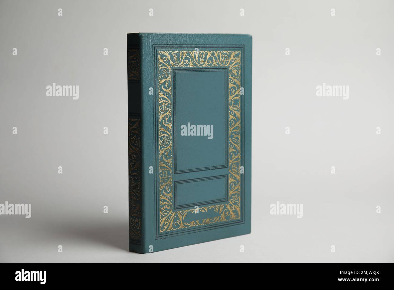 Hardcover book on light grey background. Space for design Stock Photo ...