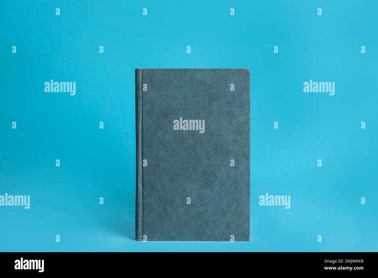 Hardcover book on blue background. Space for design Stock Photo - Alamy
