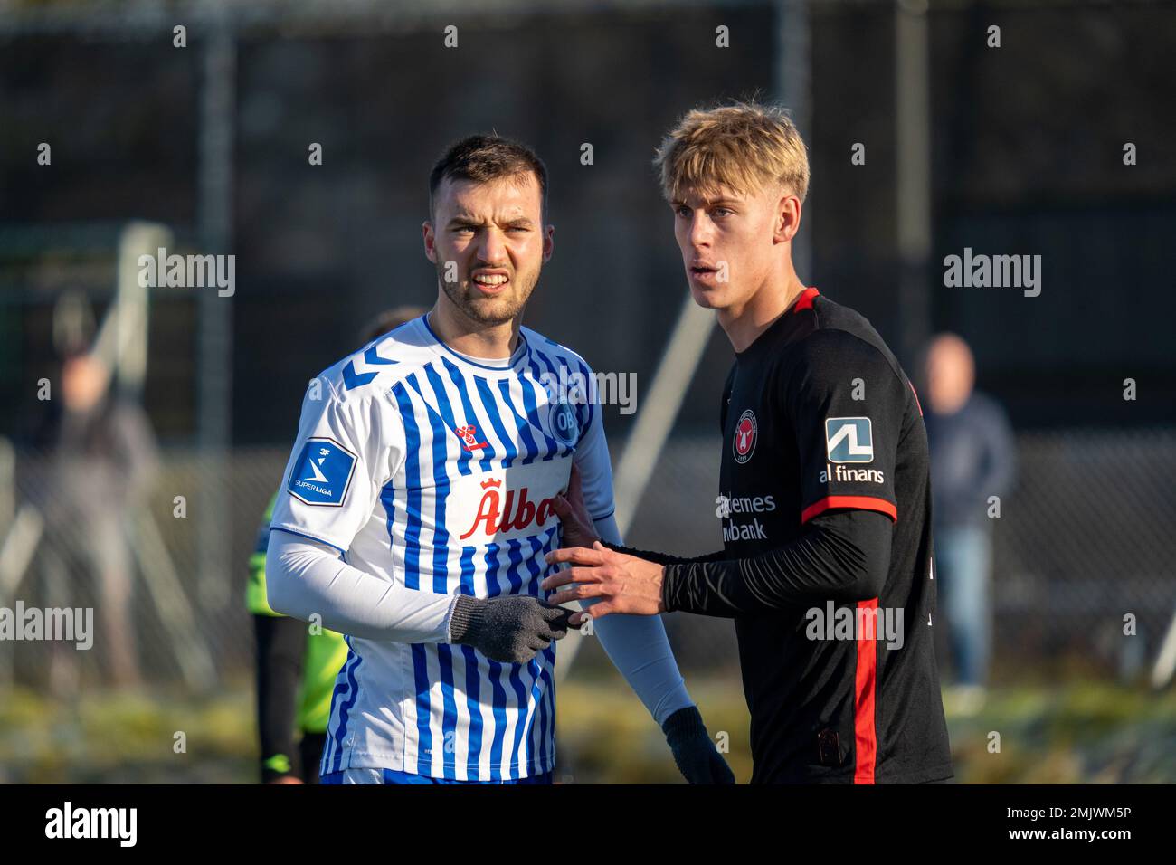 Ikast, Denmark. 27th, January 2023. Mihajlo Ivancevic (L) of Odense ...