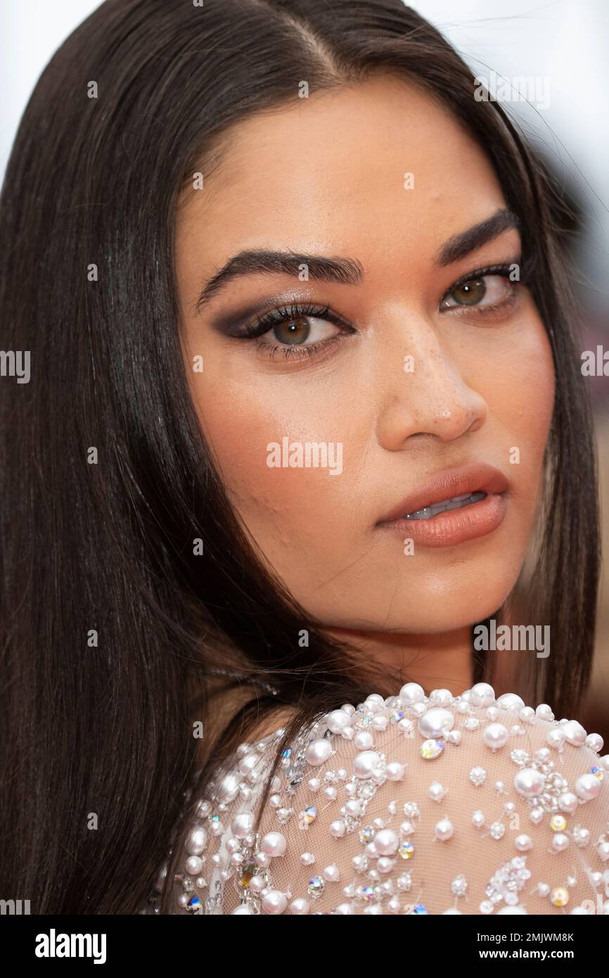 Model Shanina Shaik poses for photographers upon arrival at the ...