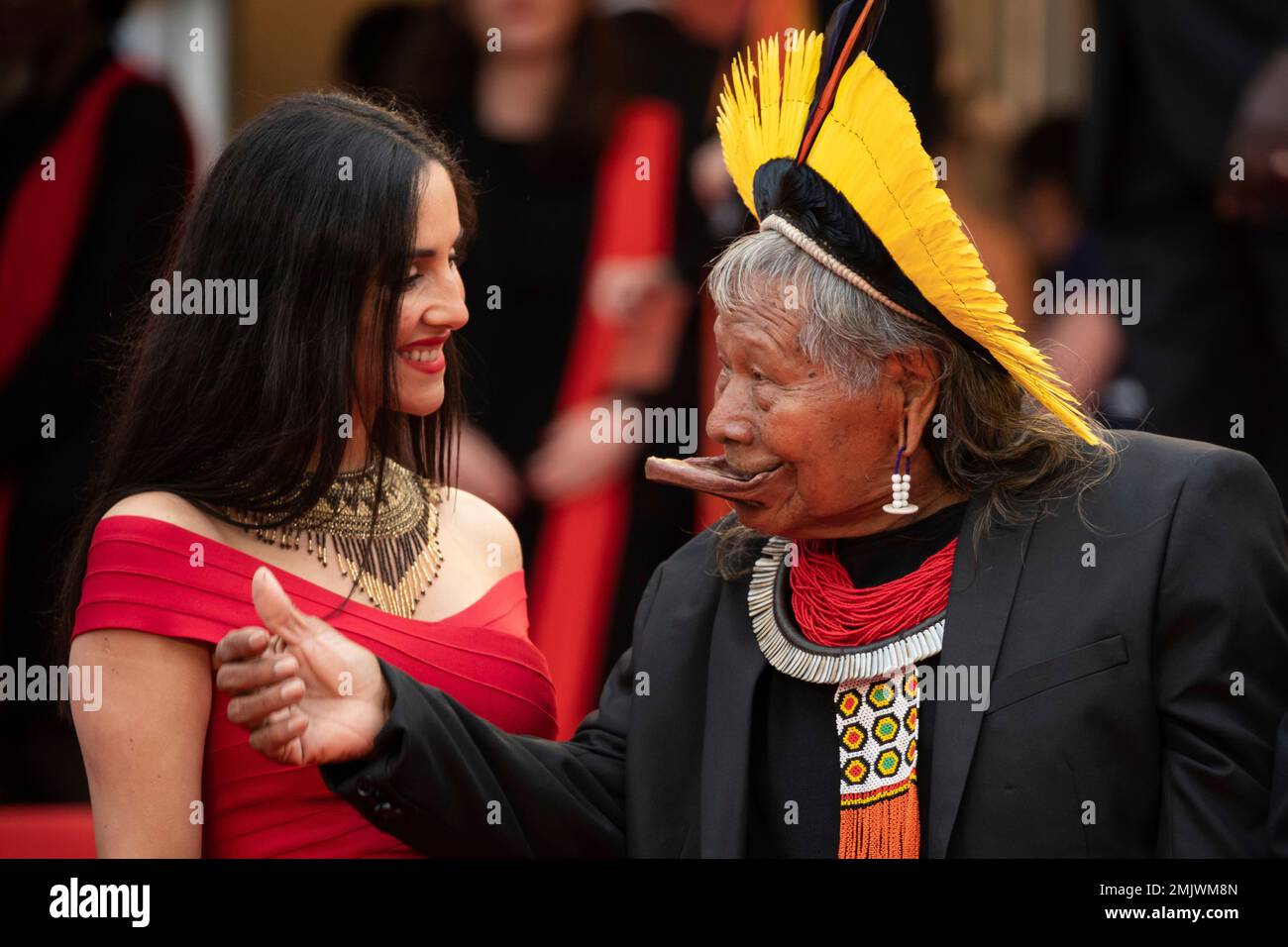 Chief Raoni Metuktire of the Kayapo people, center, poses for ...