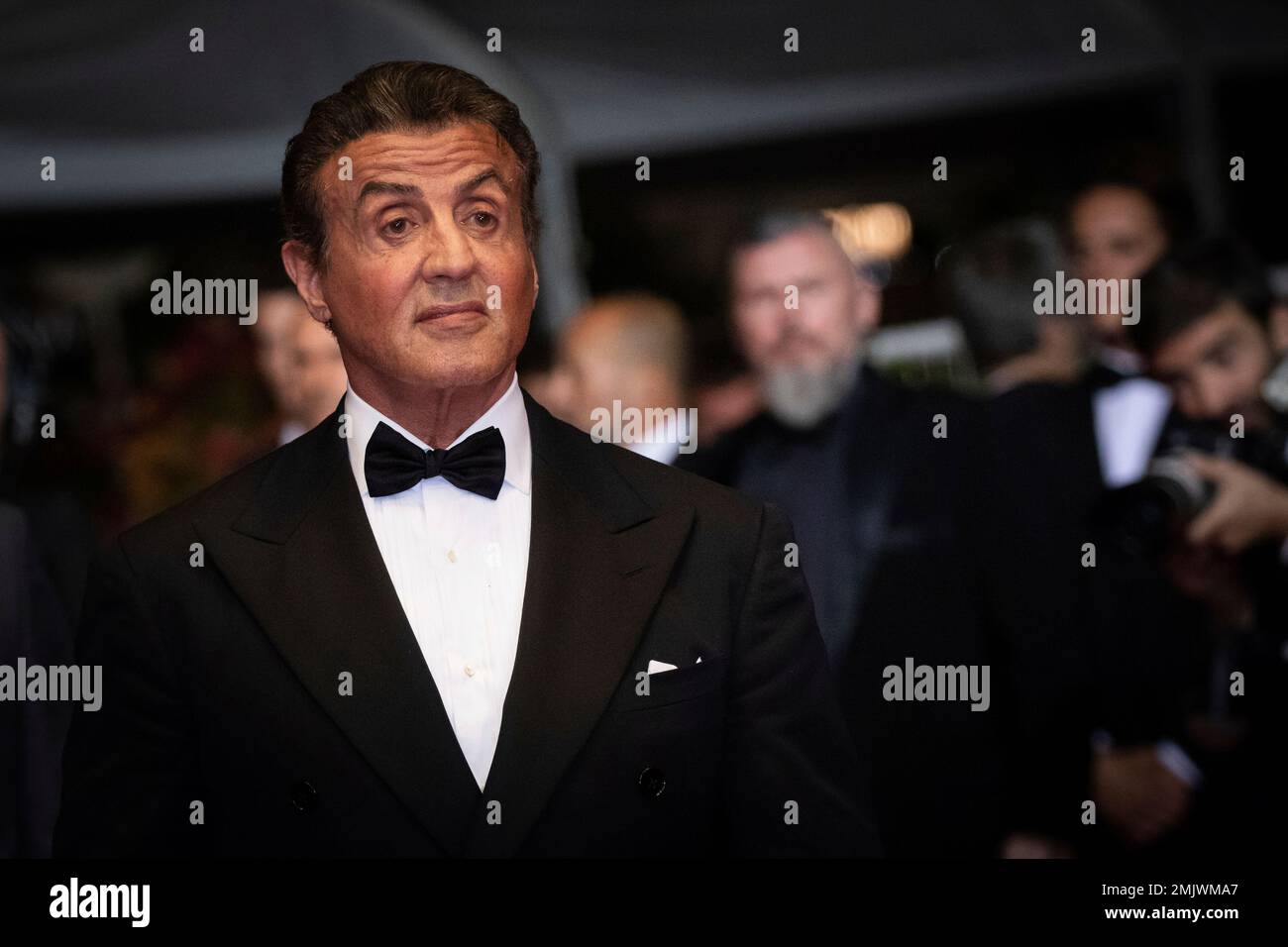 Actor Sylvester Stallone poses for photographers upon arrival at the ...