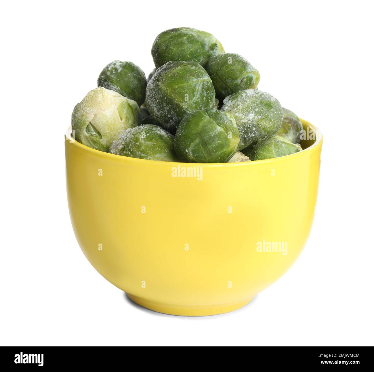 Frozen Brussels sprouts in bowl isolated on white. Vegetable ...