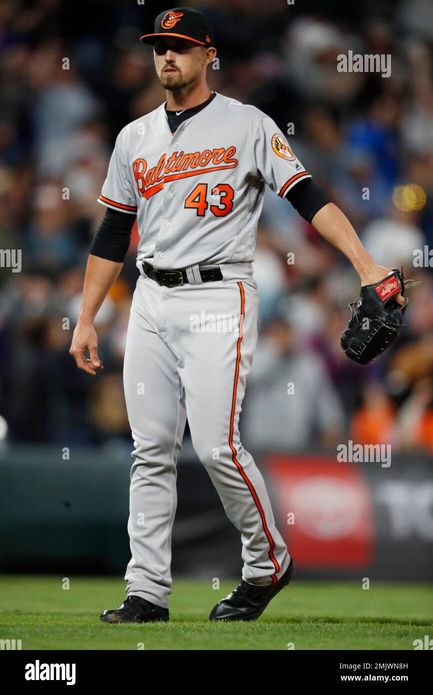 Baltimore Orioles relief pitcher Shawn Armstrong reacts after giving up ...