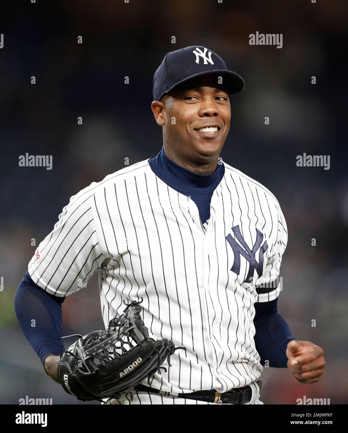 New York Yankees relief pitcher Aroldis Chapman smiles affter getting ...