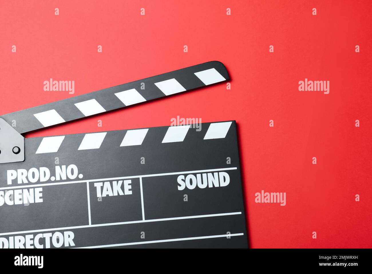 Clapper board on red background, top view. Cinema production Stock ...