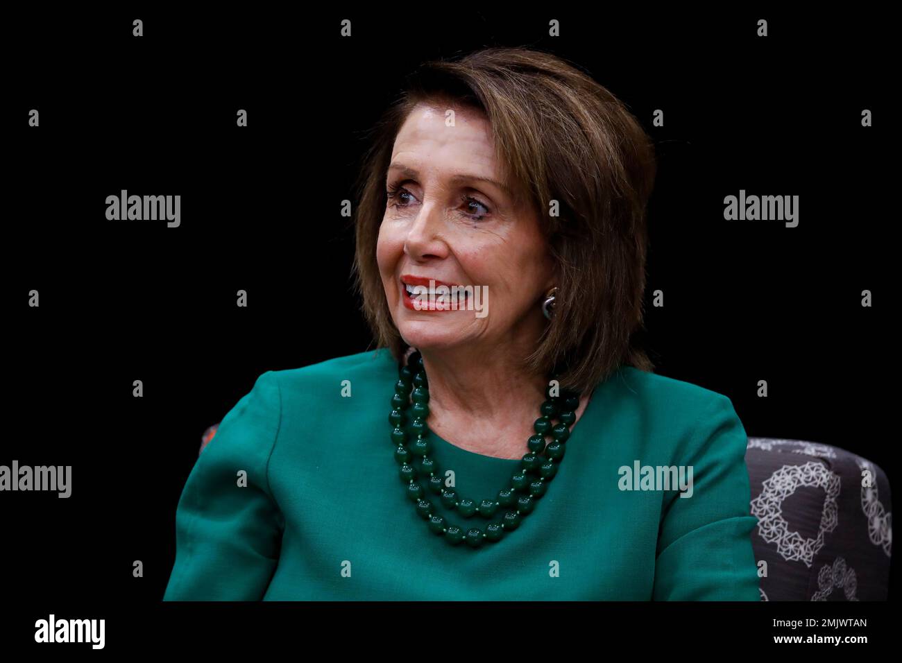 Speaker of the House Nancy Pelosi, D-Calif., smiles during a panel ...
