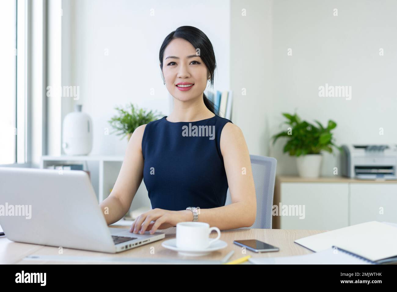 Ms young business office Stock Photo - Alamy